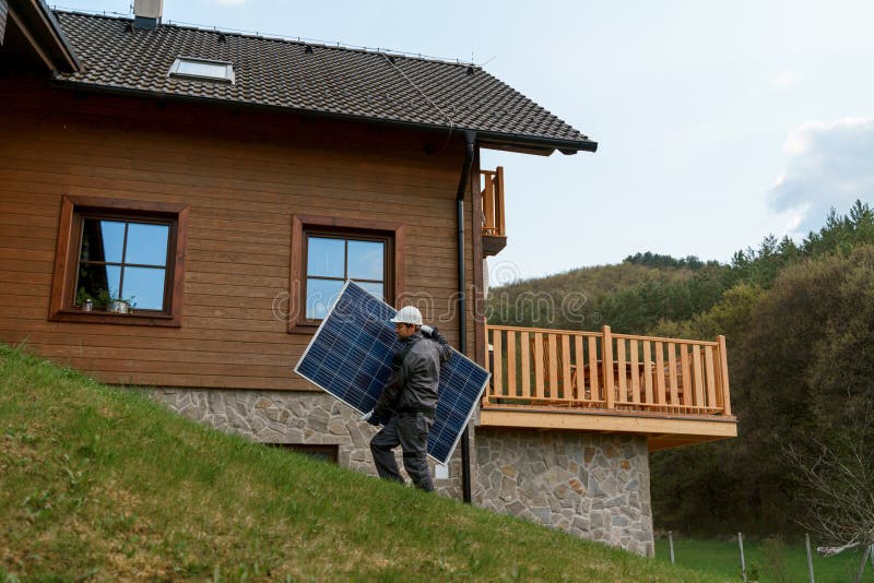 Man Worker Carrying Solar Panel for Installing Solar Modul System on ...