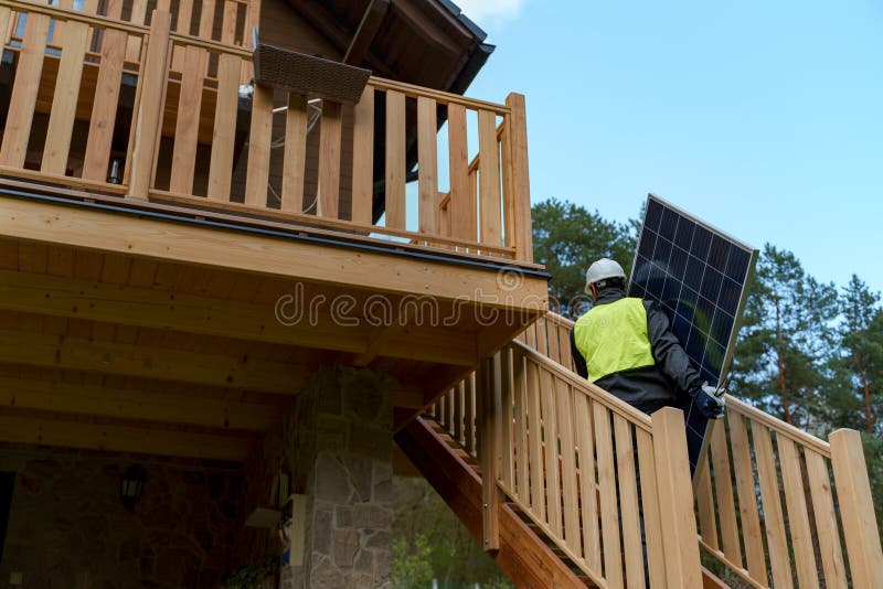 Man Worker Carrying Solar Panel for Installing Solar Modul System on ...