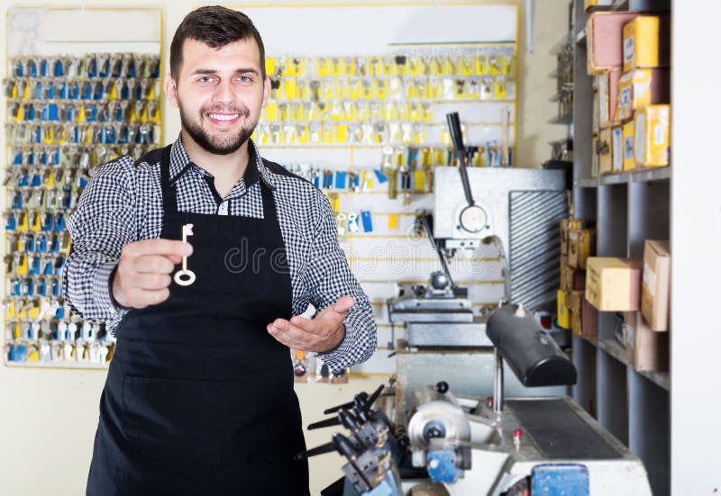 Man Worker Demonstrating Result of Key Forming Stock Photo - Image of ...