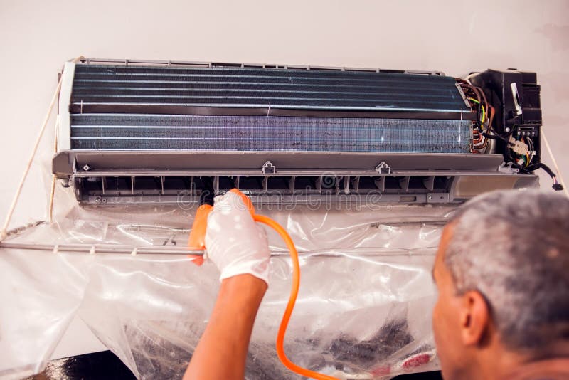 Man Worker Doing Cleaning of Air Conditioning Stock Image - Image of ...
