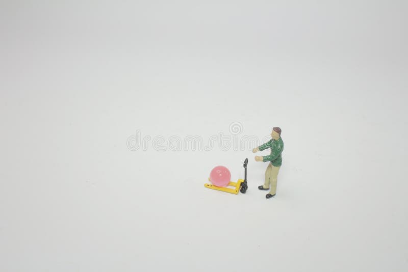 A Man Worker Figure Using a Trolley Towing Stock Photo - Image of ...