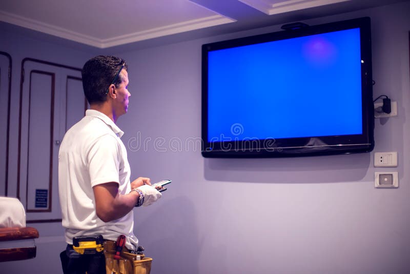 A Man Worker Fix Tv with Blue Screen Stock Image - Image of indoor ...