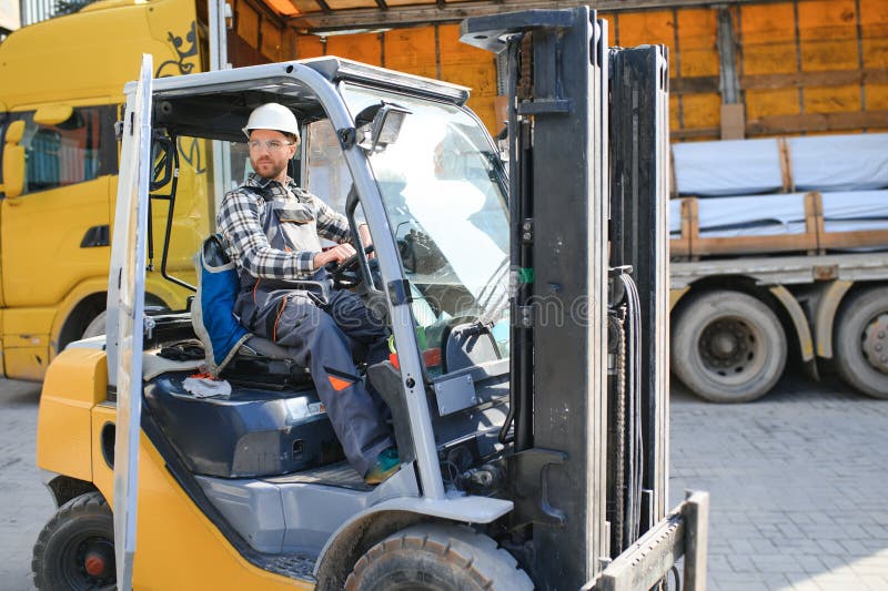 Man Worker at Forklift Driver Happy Working in Industry Factory ...
