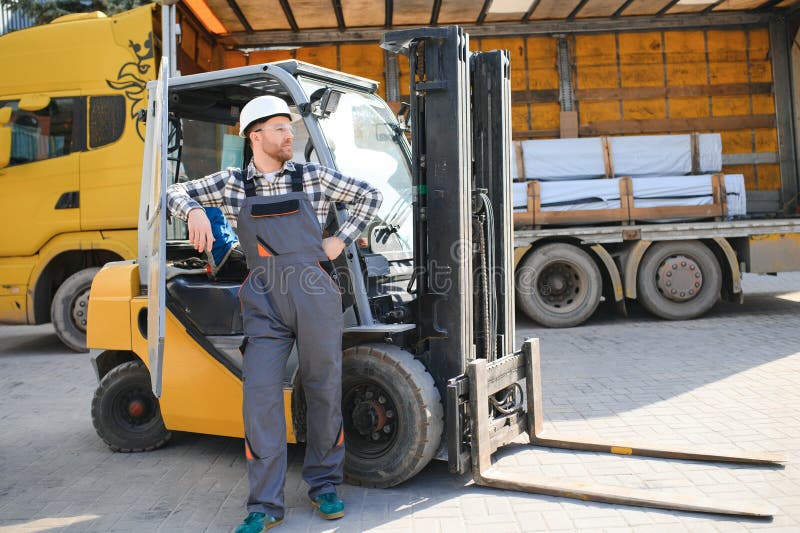 Man Worker at Forklift Driver Happy Working in Industry Factory ...