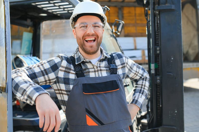 Man Worker at Forklift Driver Happy Working in Industry Factory ...