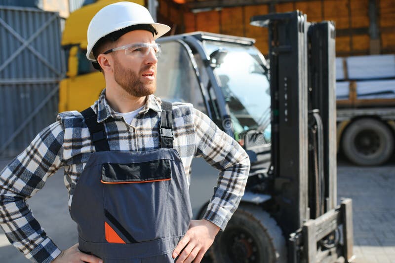 Man Worker at Forklift Driver Happy Working in Industry Factory ...