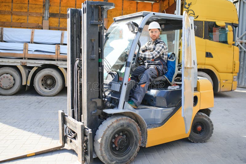 Man Worker at Forklift Driver Happy Working in Industry Factory ...