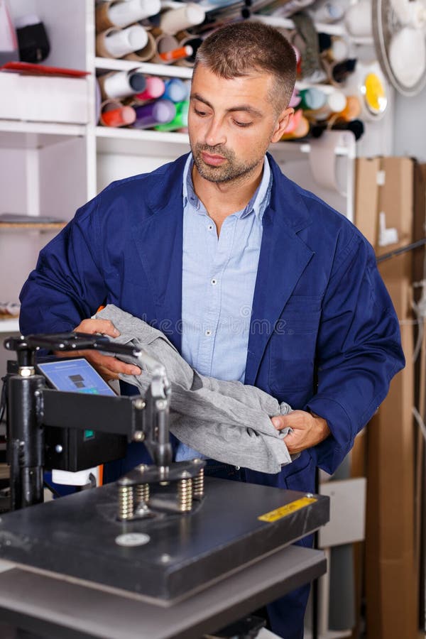 Male Worker Makes Print on Shirt Stock Image - Image of fashion, plant ...
