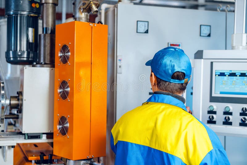 Man Worker in Manufacturing Plant at Cable Factory Machine Control ...