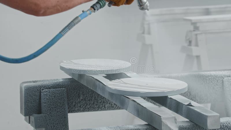 Man Worker Spraying White Paint on Two Rounded Wooden Pieces Stock ...