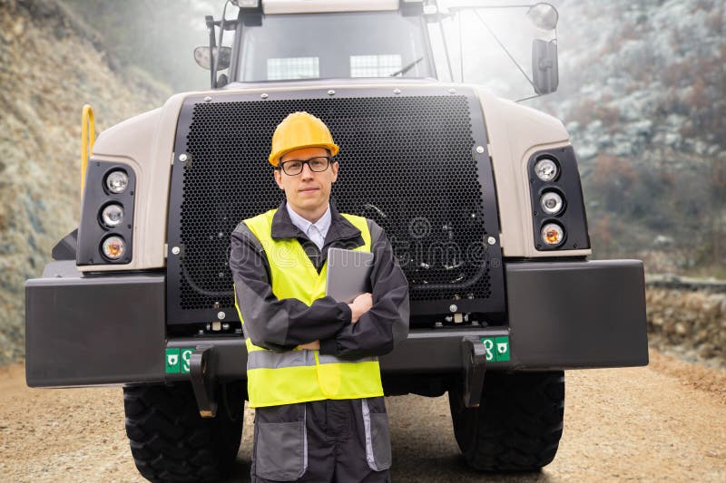Engineer with Digital Tablet on a Background of Power Line Tower. Stock ...