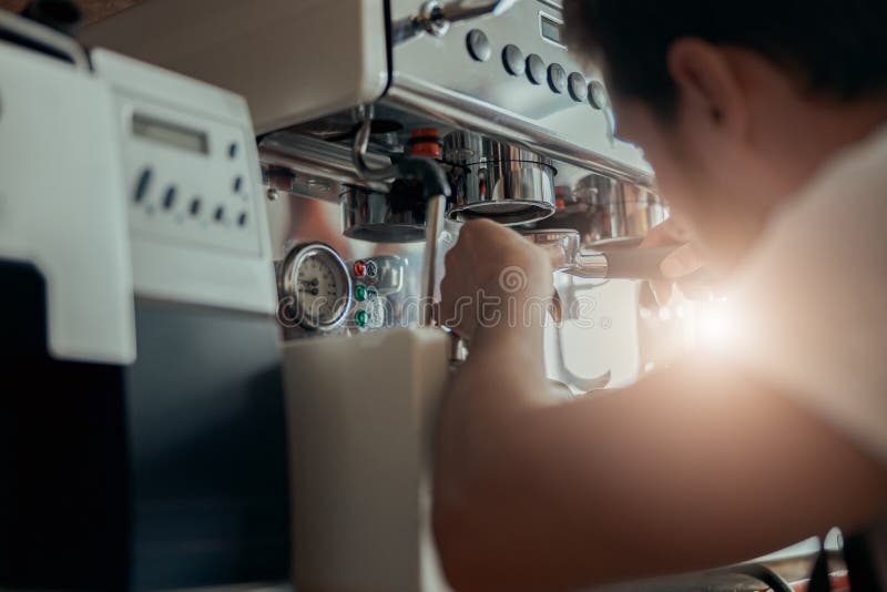 Man Worker in Uniform Inspecting Coffee Machine in Own Workshop Stock ...