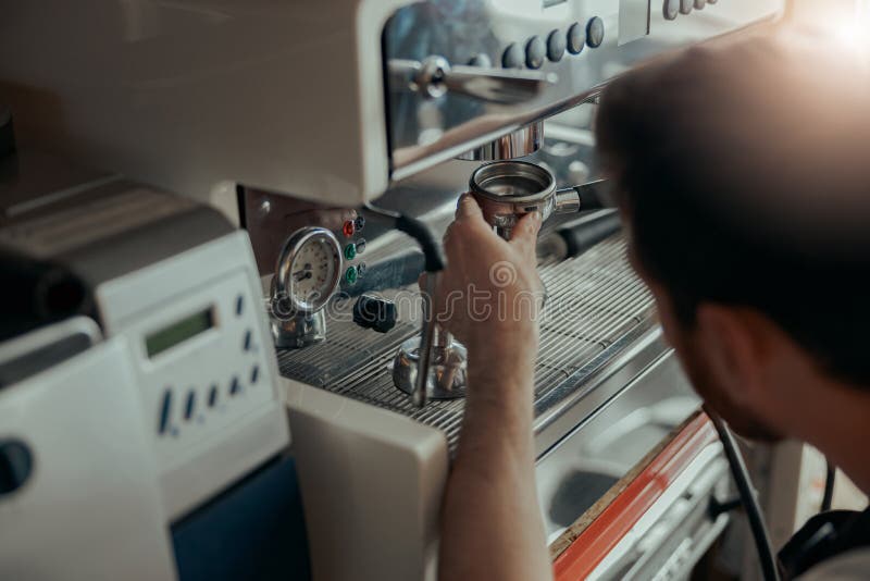 Man Worker in Uniform Inspecting Coffee Machine in Own Workshop Stock ...