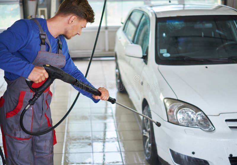 Man Worker Washing Car on a Car Wash Stock Image - Image of equipment ...