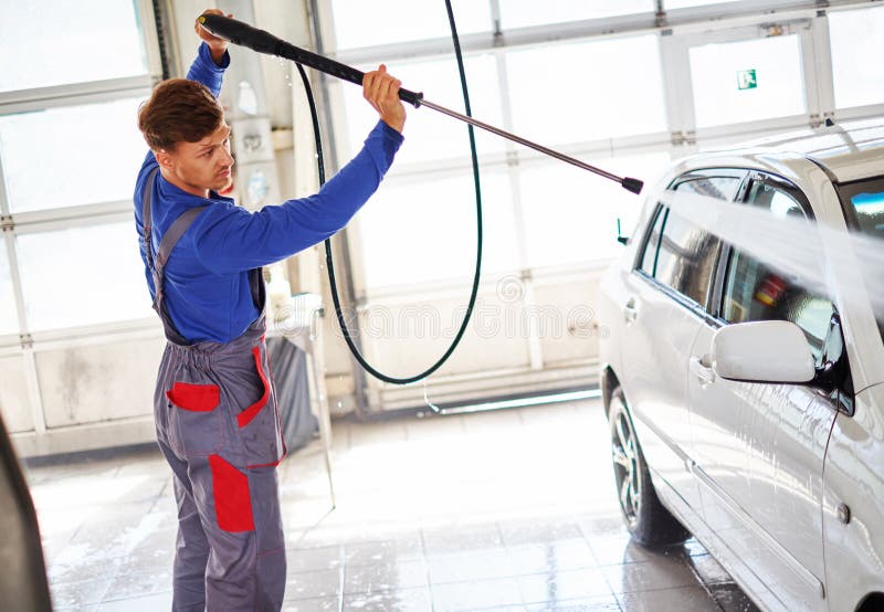 Man Worker Washing Car on a Car Wash Stock Image - Image of wash ...