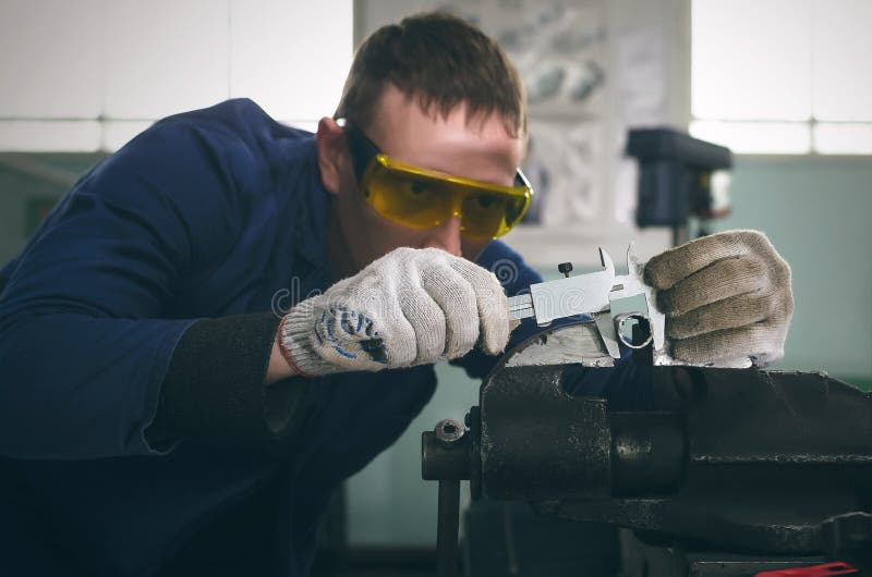 Worker. stock image. Image of diameter, measuring, iron - 129466861