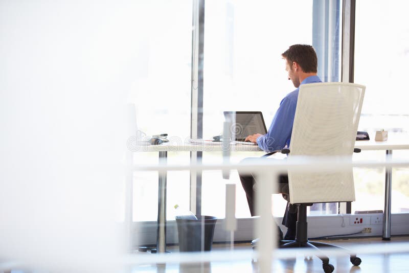 Man Working Alone in a Modern Office Stock Photo - Image of work ...
