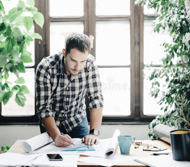 Man Working on Architectural Project Stock Photo - Image of ...