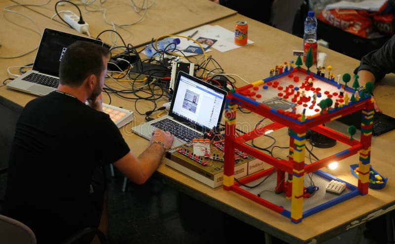 People Handle Arduino Components in a Workshop at Sonar Barcelona ...