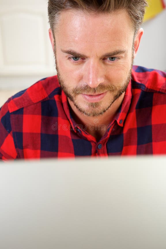Man Working Behind Computer Screen Stock Image - Image of caucasian ...