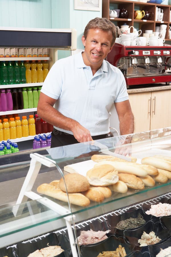 Man Working Behind Counter in Cafe Stock Photo - Image of person ...