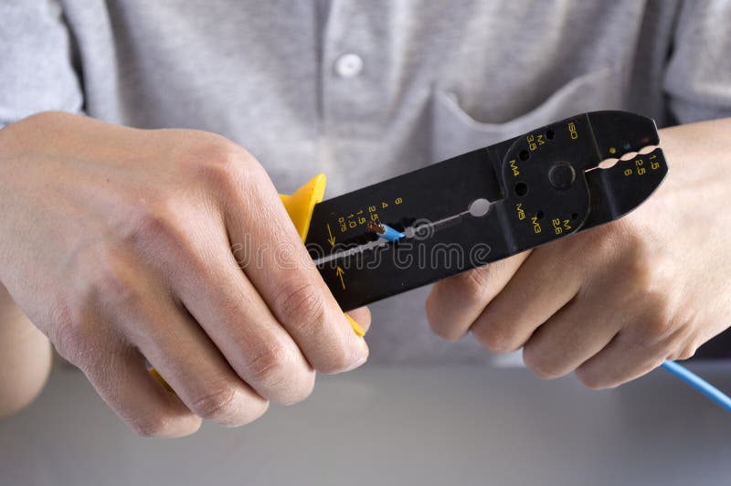 Man working cable cutting stock photo. Image of adult - 30681314