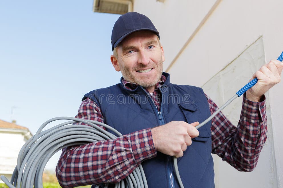 Man Working with Cables Outdoors Stock Photo - Image of climbing ...