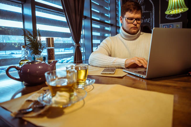 Man Working in Cafe with Laptop Stock Image - Image of internet, coffee ...