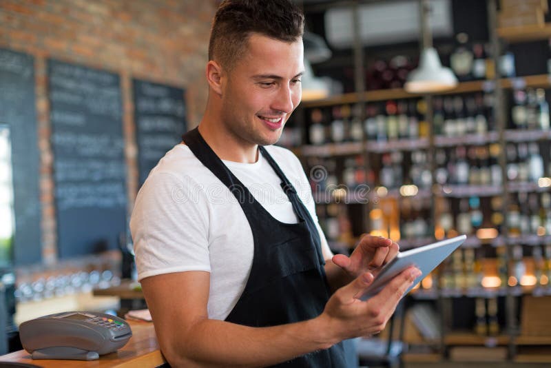 Man working at cafe stock photo. Image of friendly, seller - 95295756