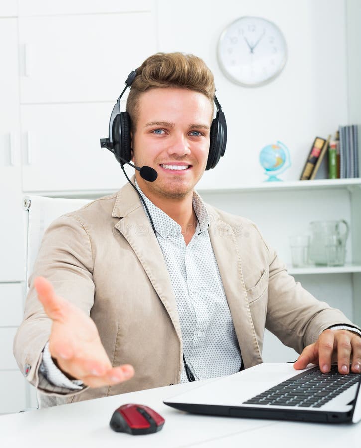 Man working in call centre stock image. Image of employee - 261810571