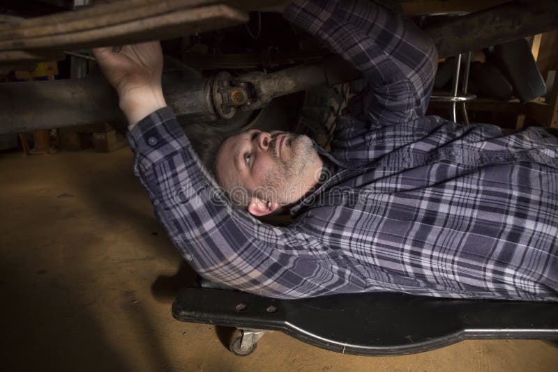 Man working on car stock image. Image of motor, fixing - 49384187