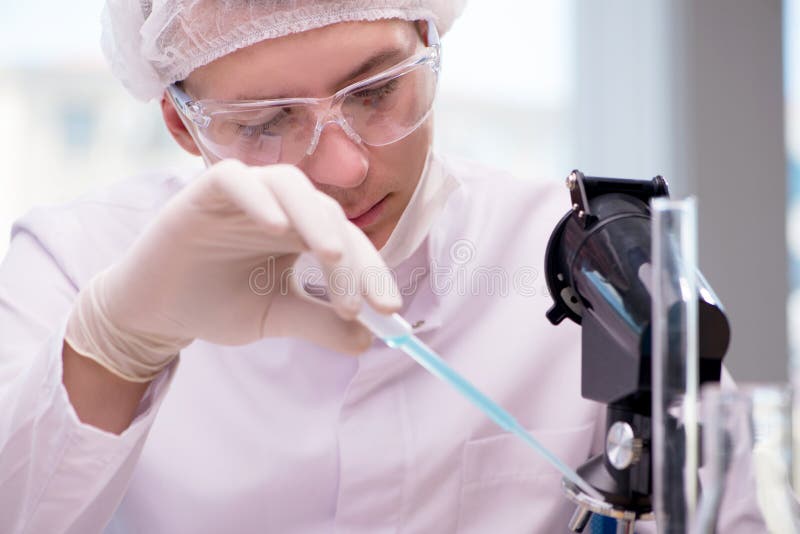 The Man Working in the Chemical Lab on Science Project Stock Photo ...