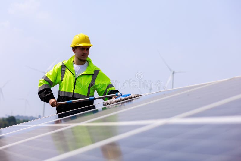 Man is Working on Cleaning Solar Panels Stock Photo - Image of ...