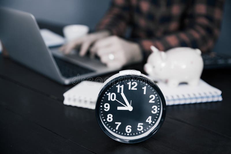 Man Working with Clock on Desk Stock Image - Image of businessman, desk ...