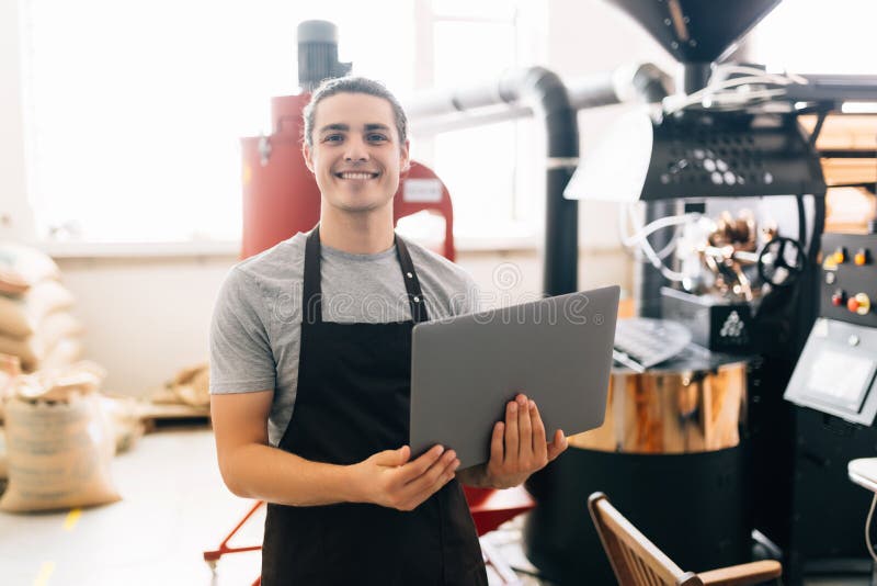 Man Working at Coffee Production. Barista Adjusting Coffee Machine and ...
