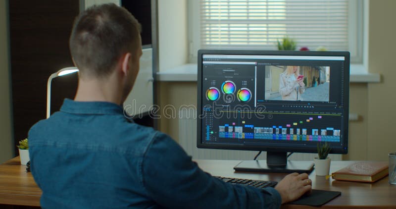 Man Working on Computer Color Correction Post Production Video or Photo ...