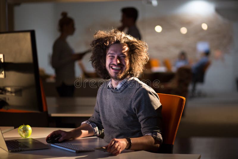 Man Working on Computer in Dark Office Stock Image - Image of office ...
