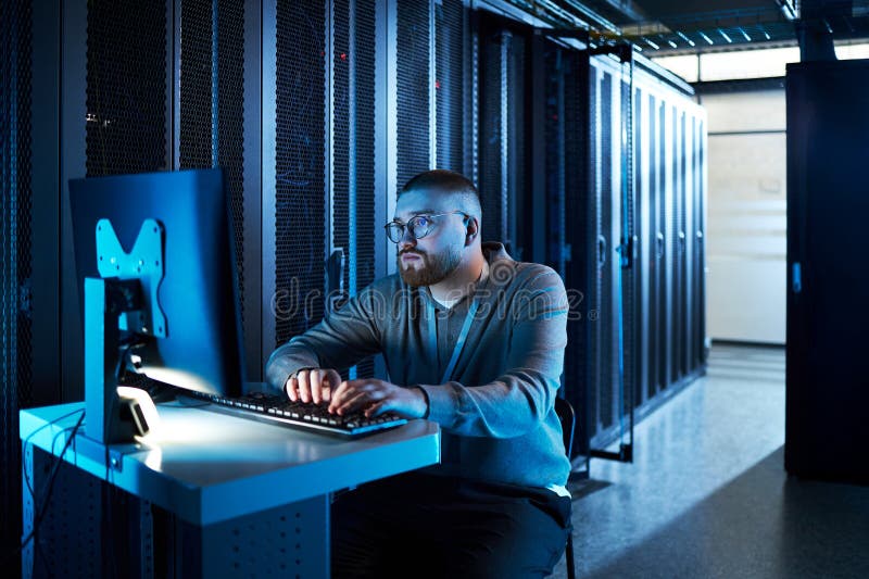 Man Working on Computer in Data Center Stock Image - Image of ethernet ...