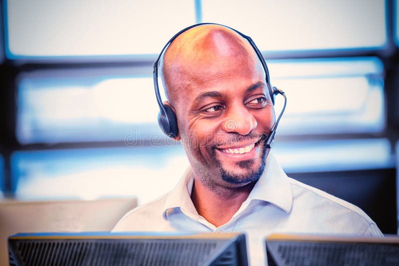 Man Working on Computer with Headset Stock Image - Image of looking ...