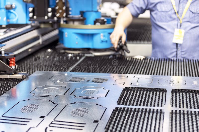 Man Working at Computer Numerical Control Programmable CNC Machine for ... Man Working at Computer Numerical Control Programmable CNC Machine for ...
