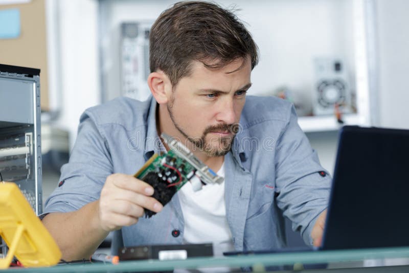 Man Working in Computer Store Stock Image - Image of female, store ...