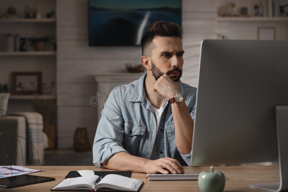 Man Working with Computer at Table in Office Stock Photo - Image of ...