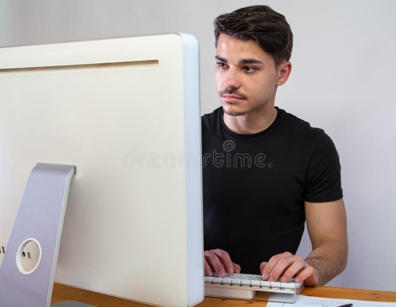 Man working on computer stock image. Image of desktop - 115536339