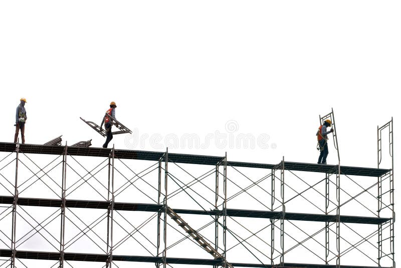 Man Working on Construction Site with Scaffold and Building with Sunset ...