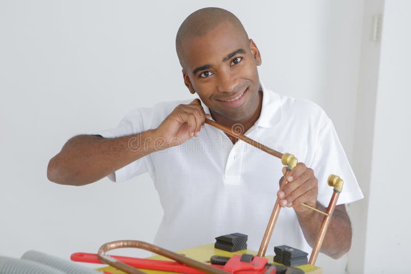 Pipe Worker Tightening Bolt Stock Photo - Image of system, fitting ...