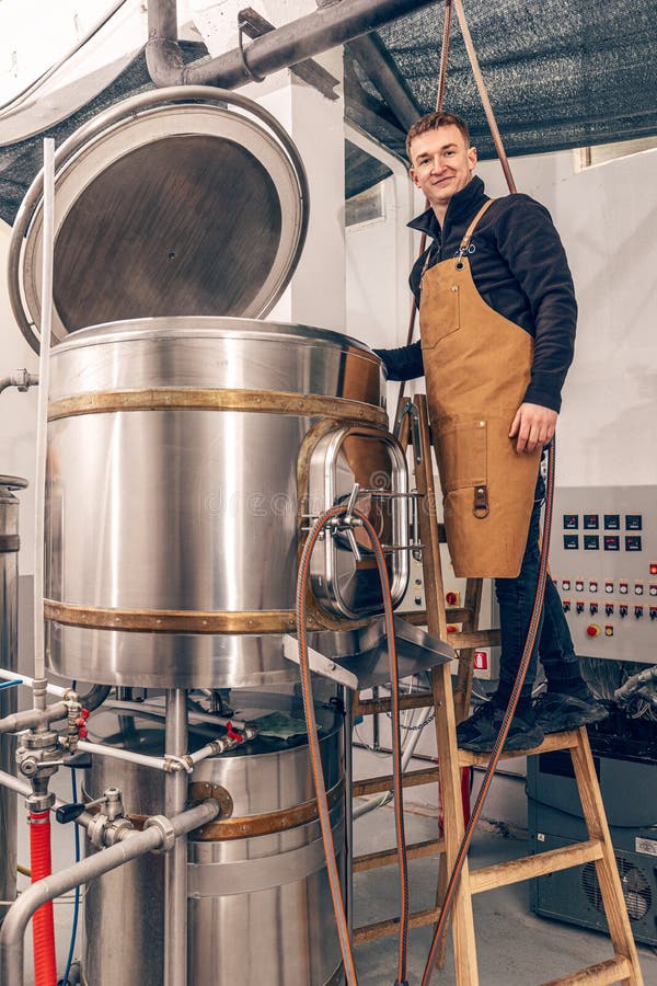 Man is Working at Craft Beer Factory Stock Photo - Image of brewery ...