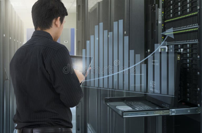 Man Working in Data Center and Use Tablet for Analyze System Stock ...