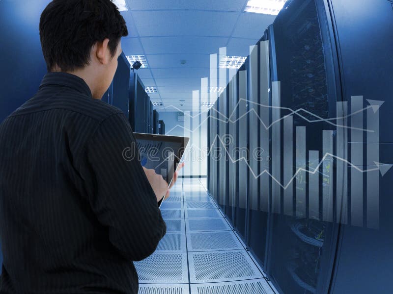 Man Working in Data Center and Use Tablet for Analyze System Stock ...
