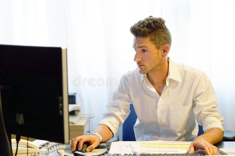Businessman at His Desk Throws Documents and Papers into the Air Stock ...