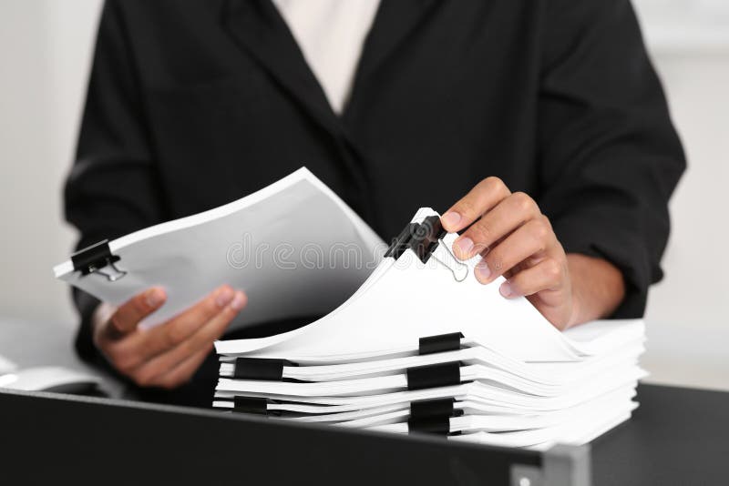 Man Working with Documents at Grey Table in Office, Closeup Stock Image ...
